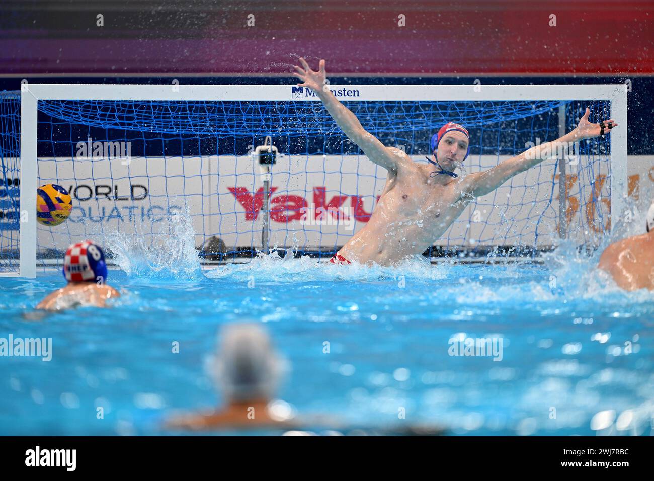 Doha, Qatar. 13th Feb, 2024. Goalkeeper of Croatia Marko Bijac attempts ...