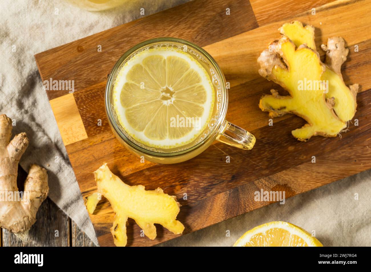 Warm Healthy Ginger Lemon Tea in a Glass Mug Stock Photo - Alamy