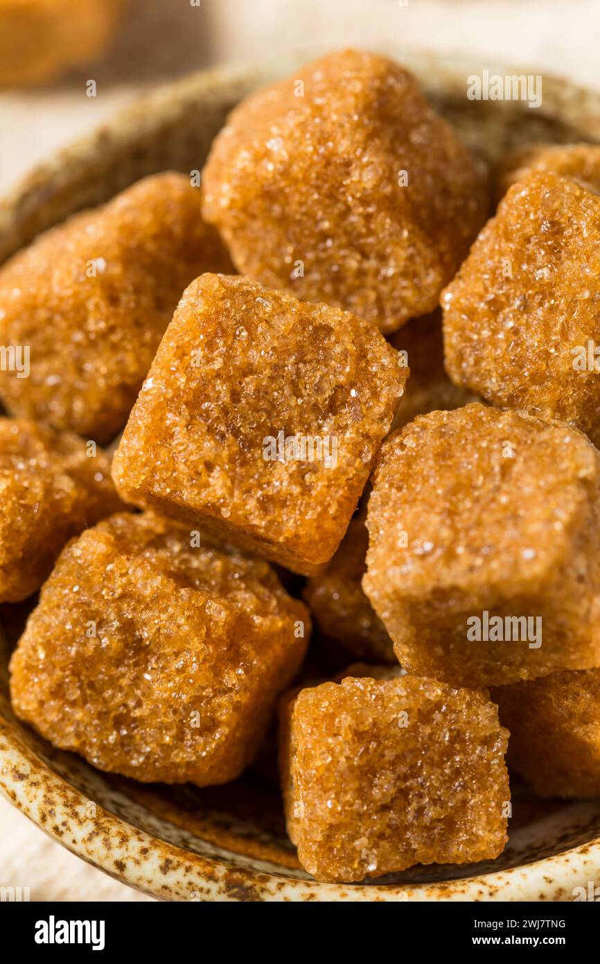 Raw sugar cube hi-res stock photography and images - Alamy