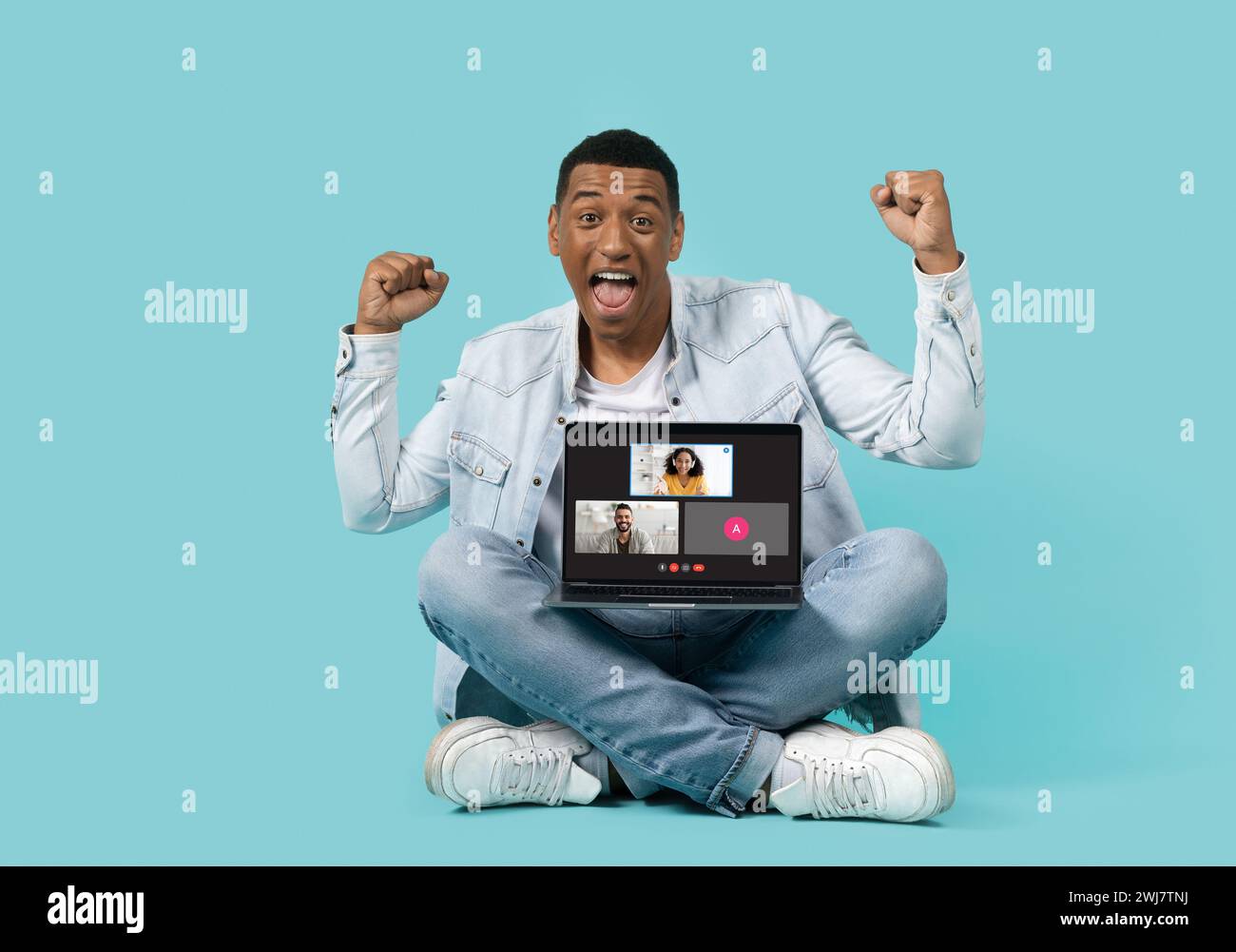 Young guy sits cross hi-res stock photography and images - Alamy