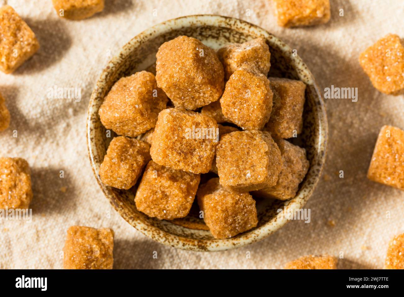 Raw sugar cube hi-res stock photography and images - Alamy