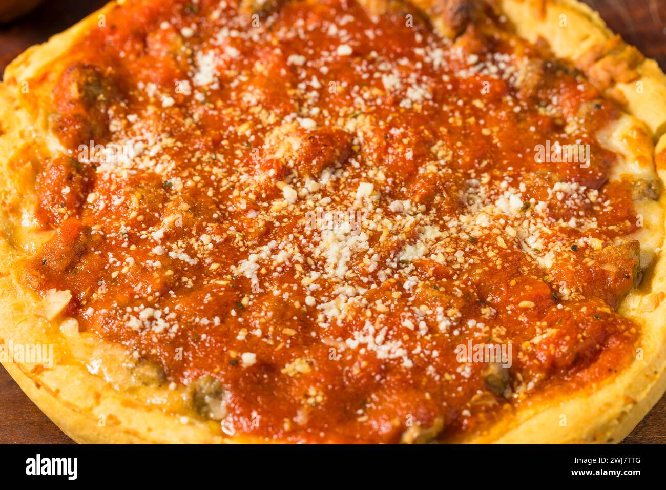 Homemade Mini Chicago Style Deep Dish Pizza with Sausage Stock Photo ...