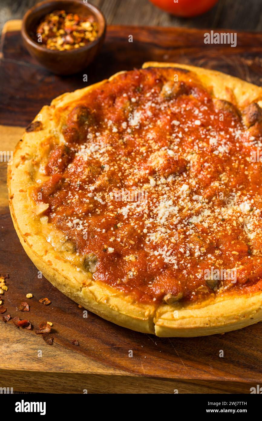 Homemade Mini Chicago Style Deep Dish Pizza with Sausage Stock Photo ...