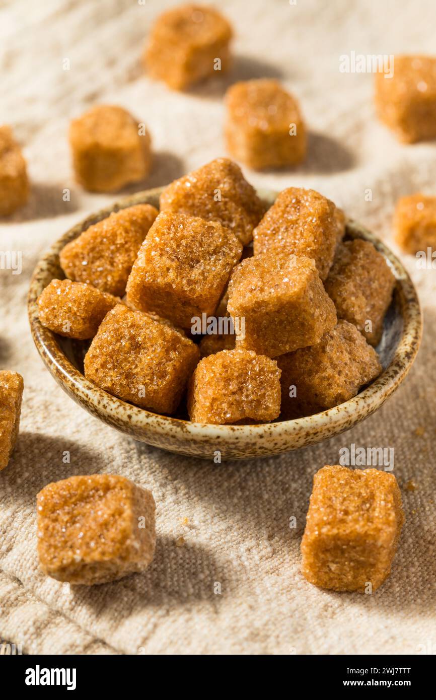 Raw sugar cube hi-res stock photography and images - Alamy