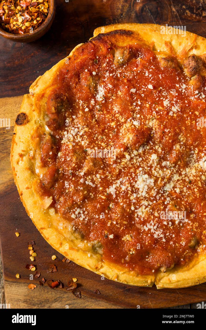 Homemade Mini Chicago Style Deep Dish Pizza with Sausage Stock Photo ...