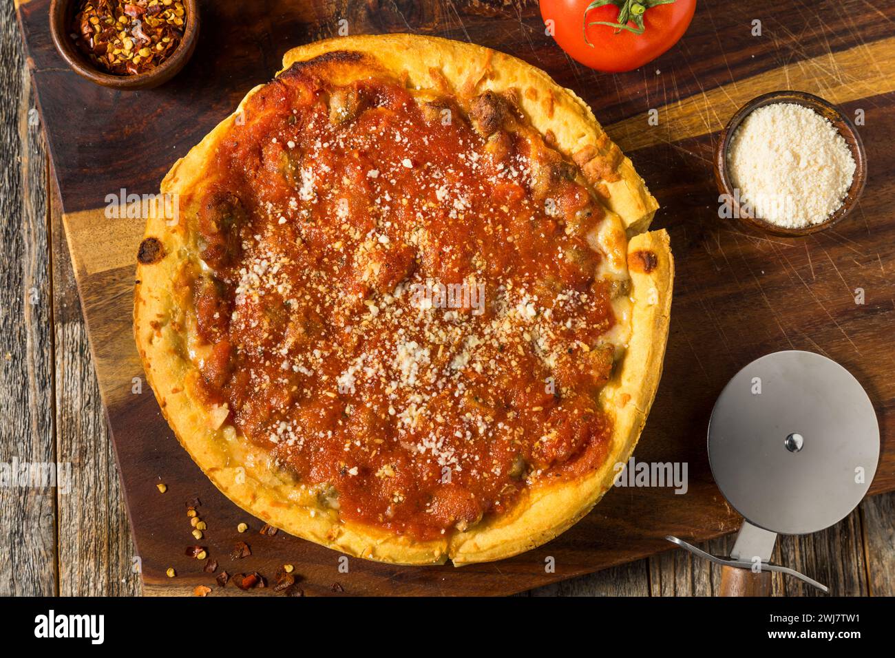 Homemade Mini Chicago Style Deep Dish Pizza with Sausage Stock Photo ...