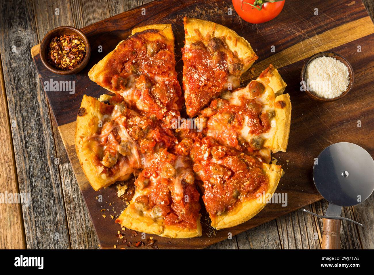 Homemade Mini Chicago Style Deep Dish Pizza with Sausage Stock Photo ...