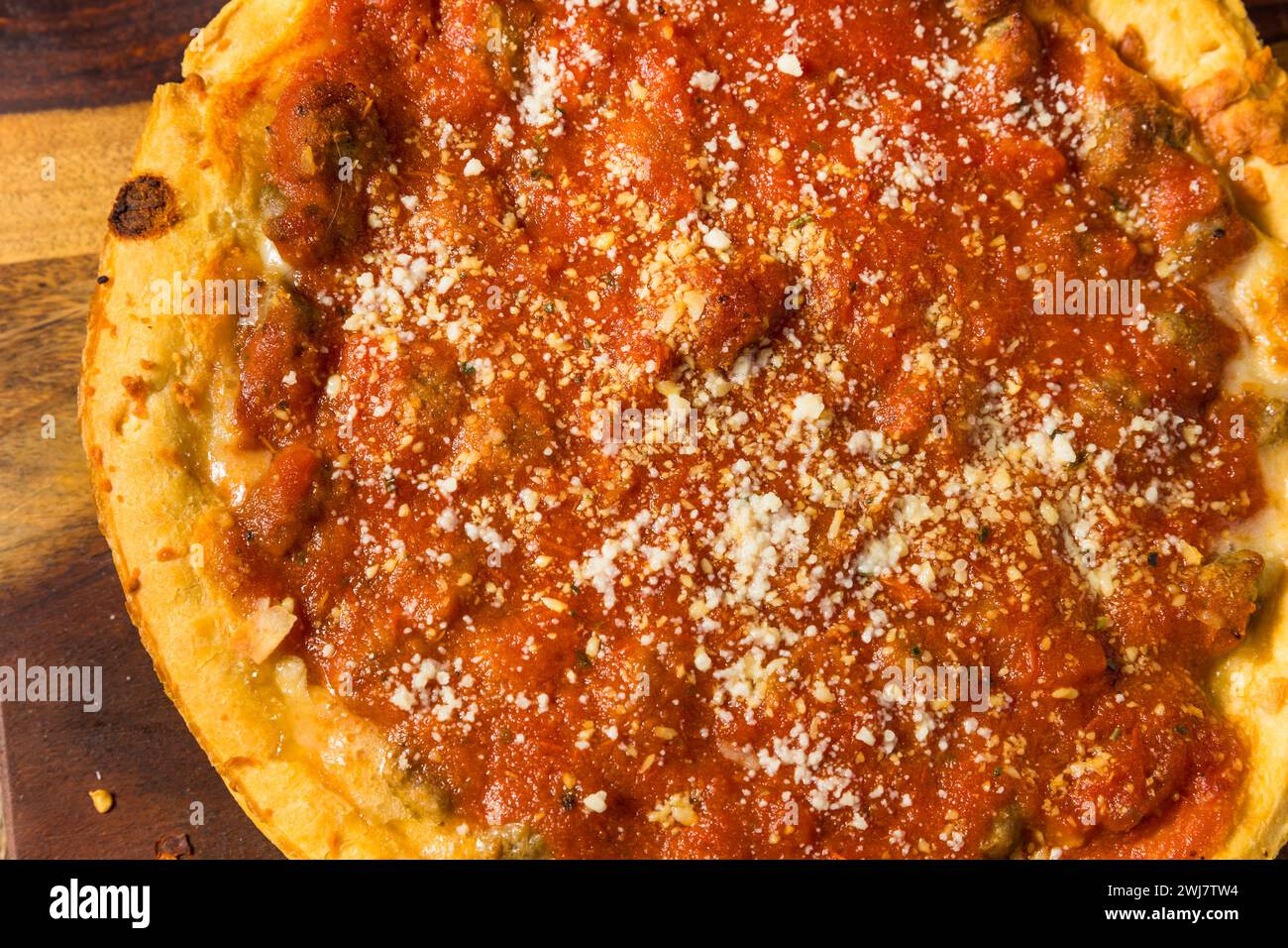Homemade Mini Chicago Style Deep Dish Pizza with Sausage Stock Photo ...