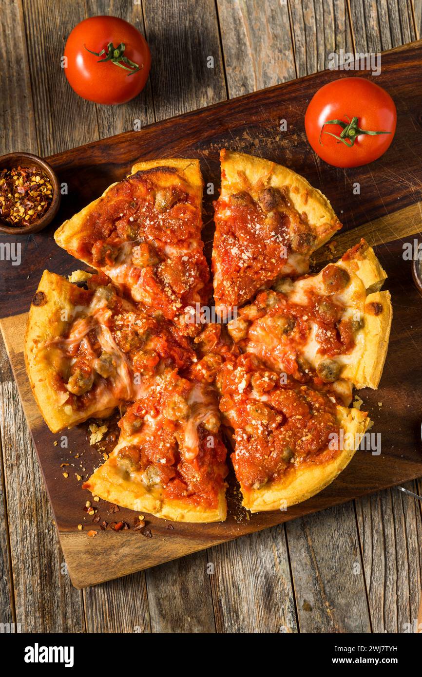 Homemade Mini Chicago Style Deep Dish Pizza with Sausage Stock Photo ...