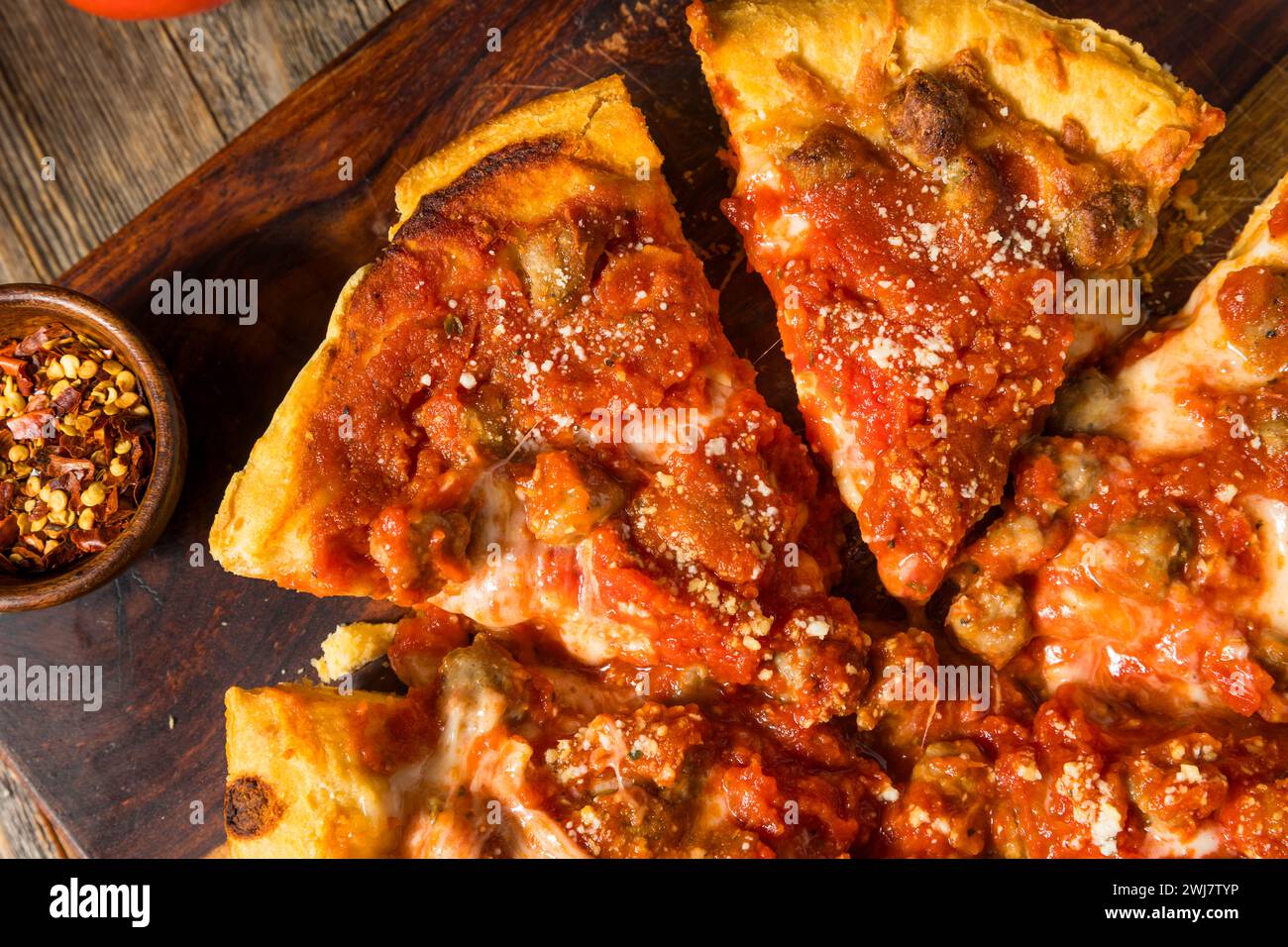 Homemade Mini Chicago Style Deep Dish Pizza with Sausage Stock Photo ...