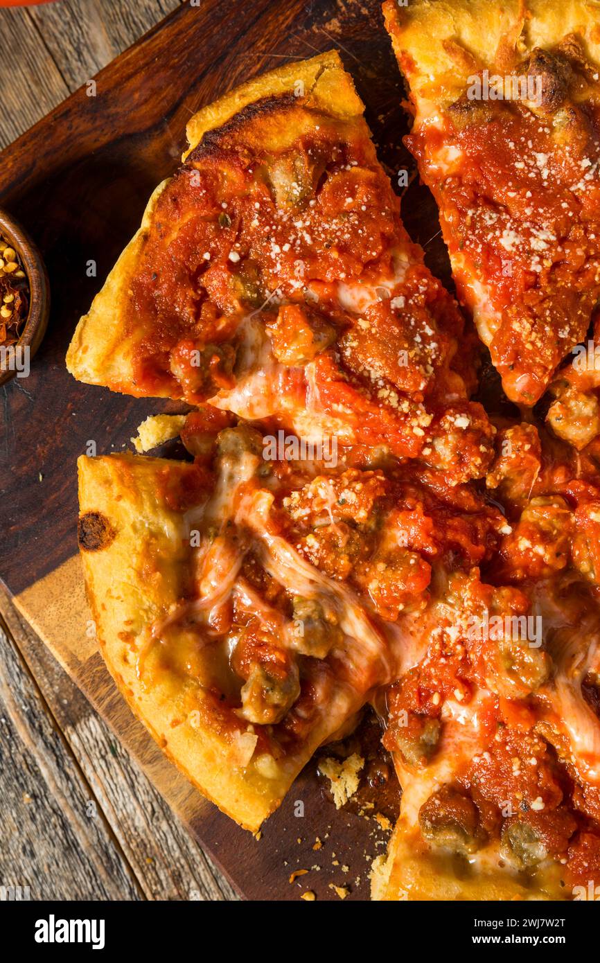 Homemade Mini Chicago Style Deep Dish Pizza with Sausage Stock Photo ...
