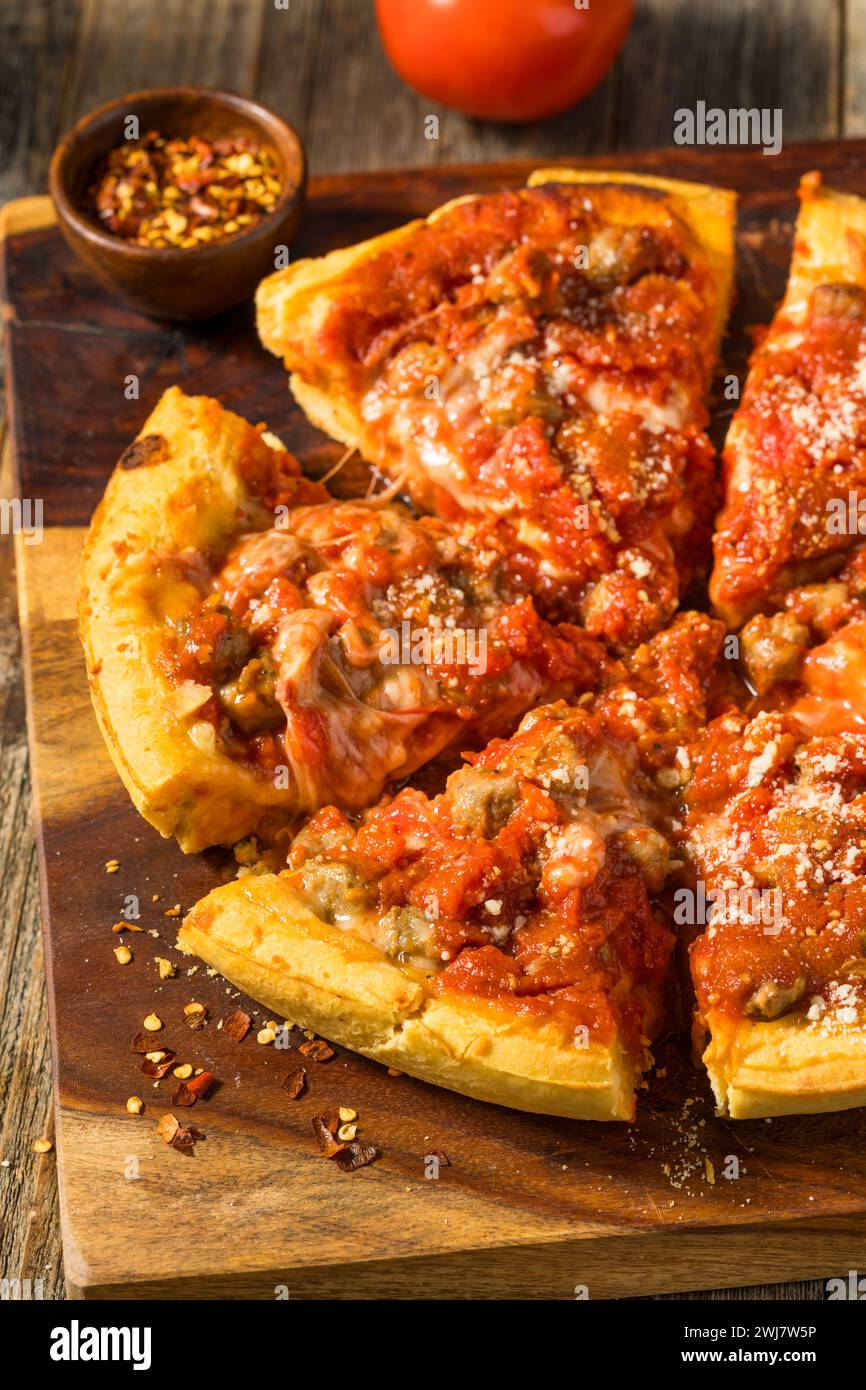 Homemade Mini Chicago Style Deep Dish Pizza with Sausage Stock Photo ...