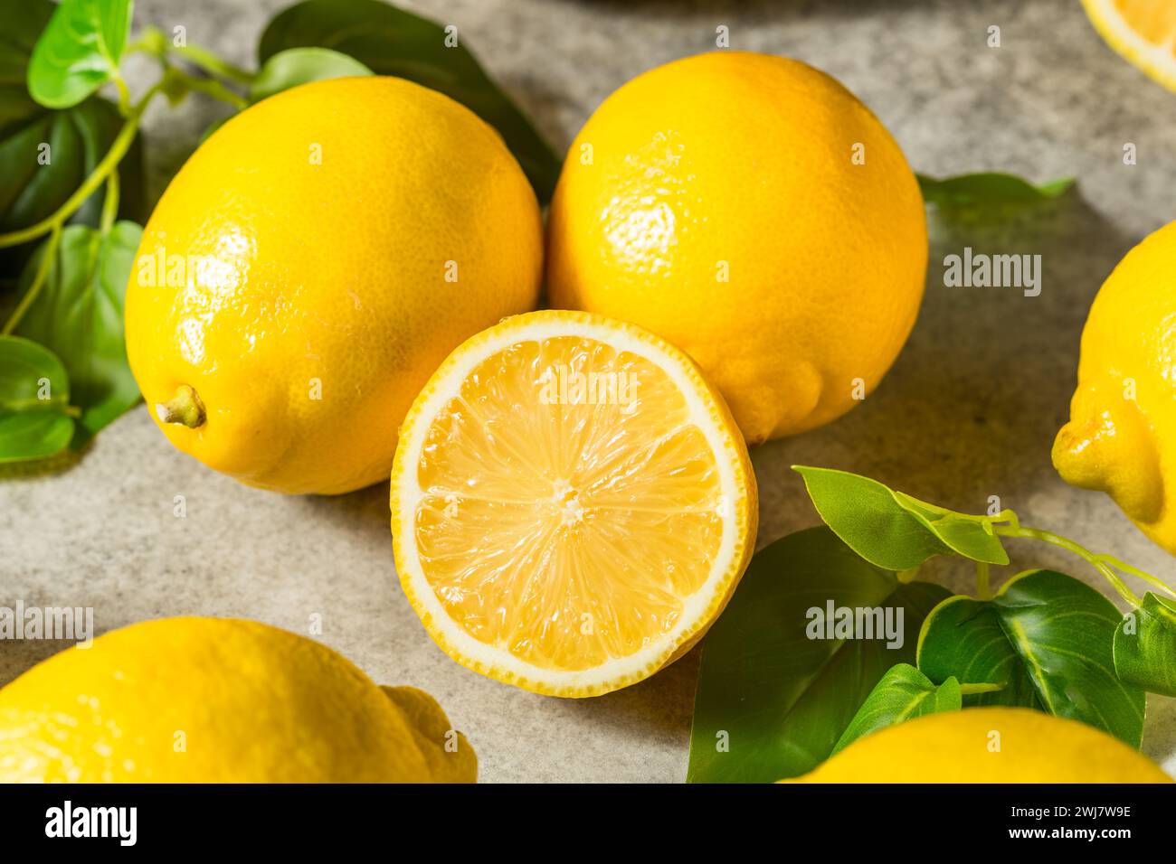 Organic Raw Yellow Seedless Lemons in a Bunch Stock Photo - Alamy
