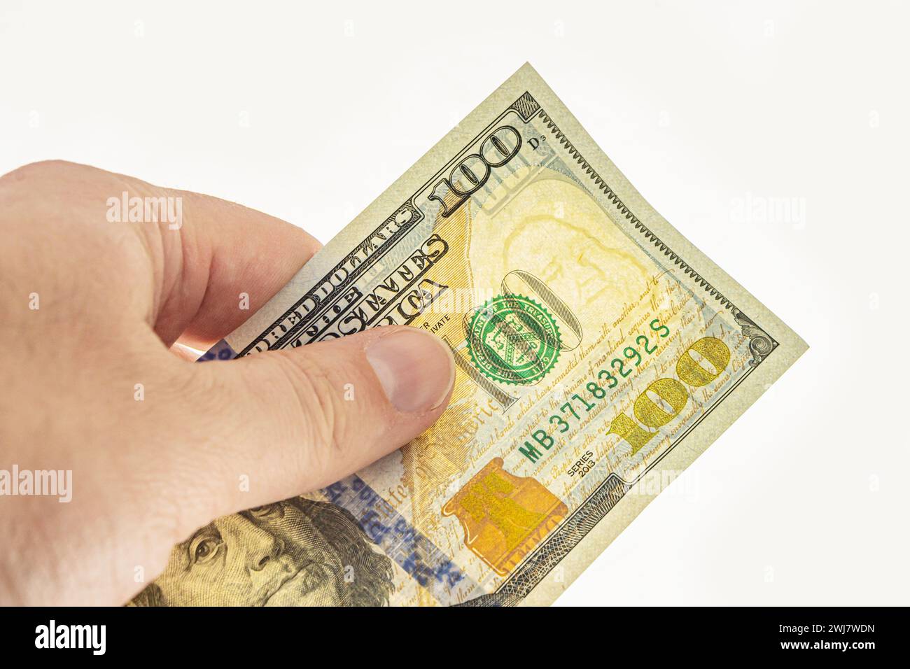 Authentication of banknote 100 dollars for clearance. Watermarks on a ...