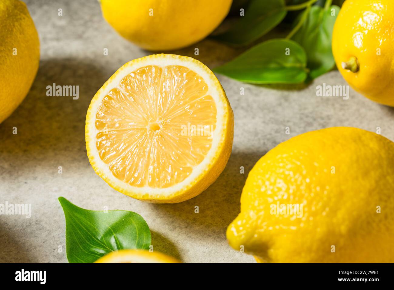 Organic Raw Yellow Seedless Lemons in a Bunch Stock Photo - Alamy