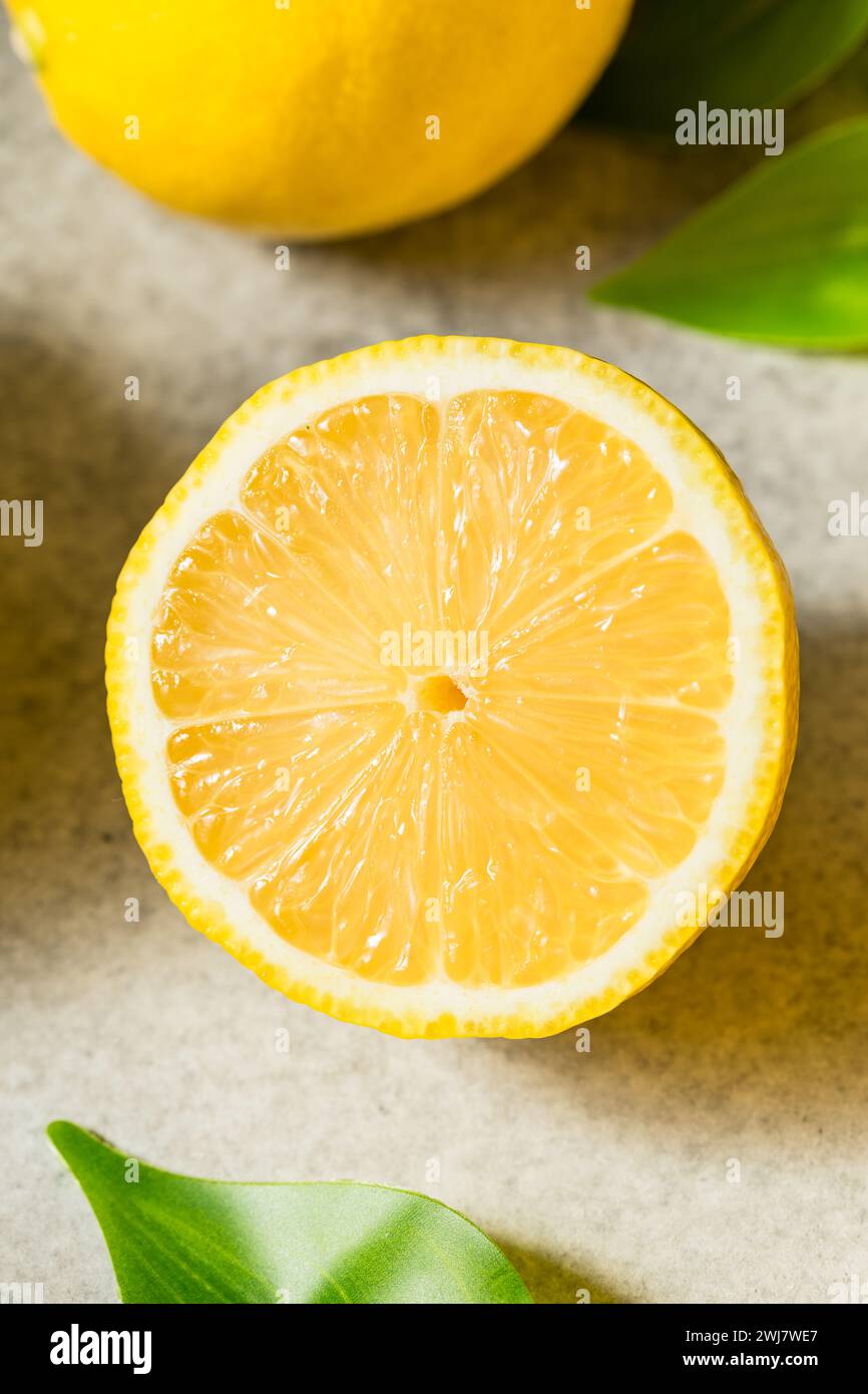 Organic Raw Yellow Seedless Lemons in a Bunch Stock Photo - Alamy
