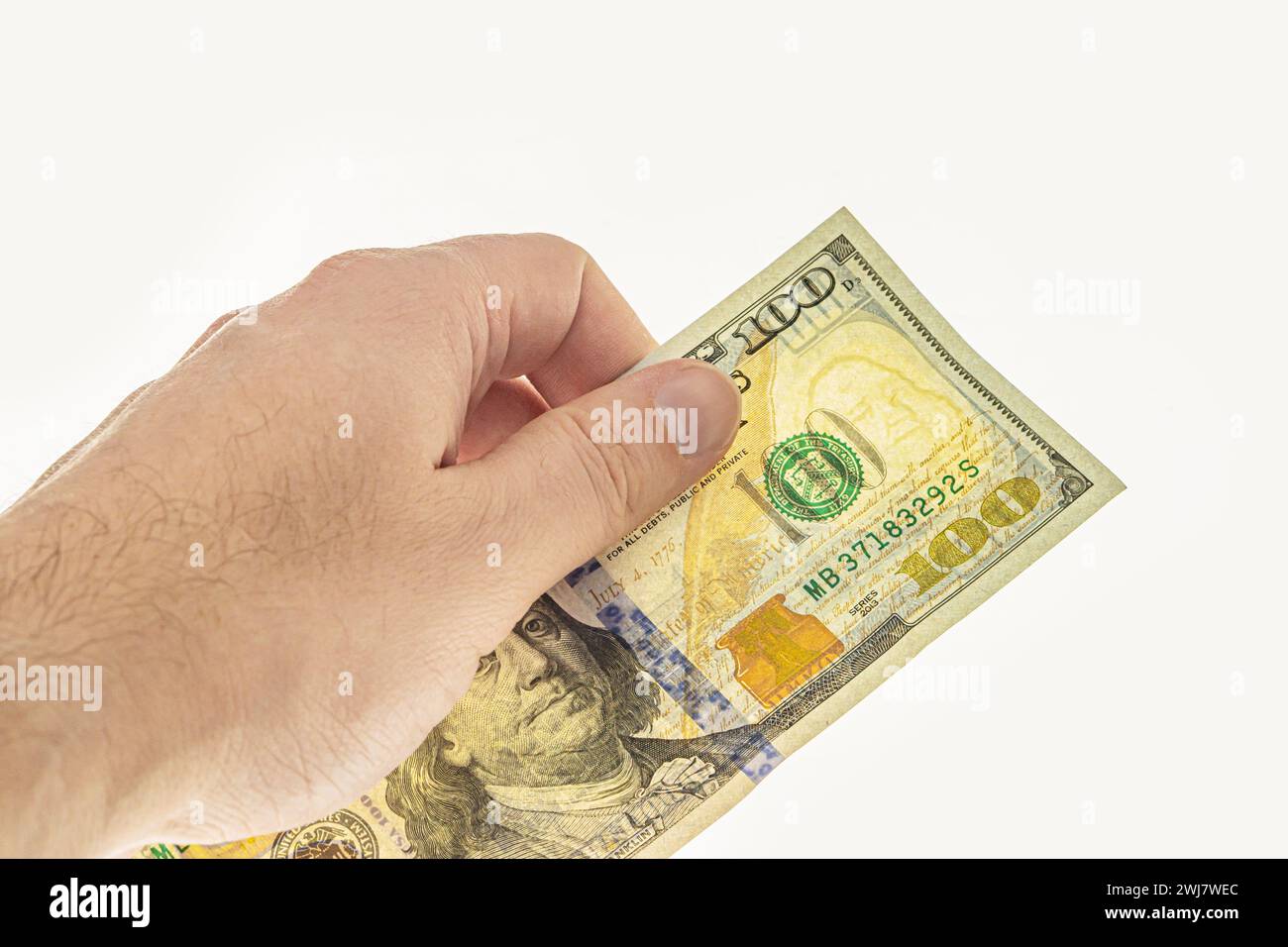 Authentication of banknote 100 dollars for clearance. Watermarks on a ...