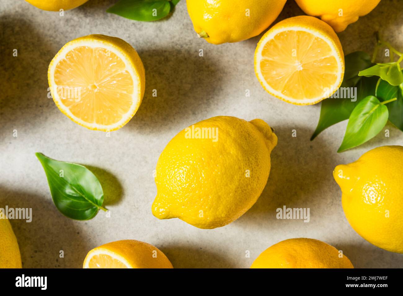 Organic Raw Yellow Seedless Lemons in a Bunch Stock Photo - Alamy