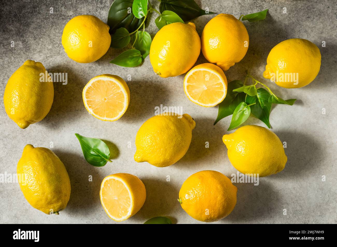 Organic Raw Yellow Seedless Lemons in a Bunch Stock Photo - Alamy