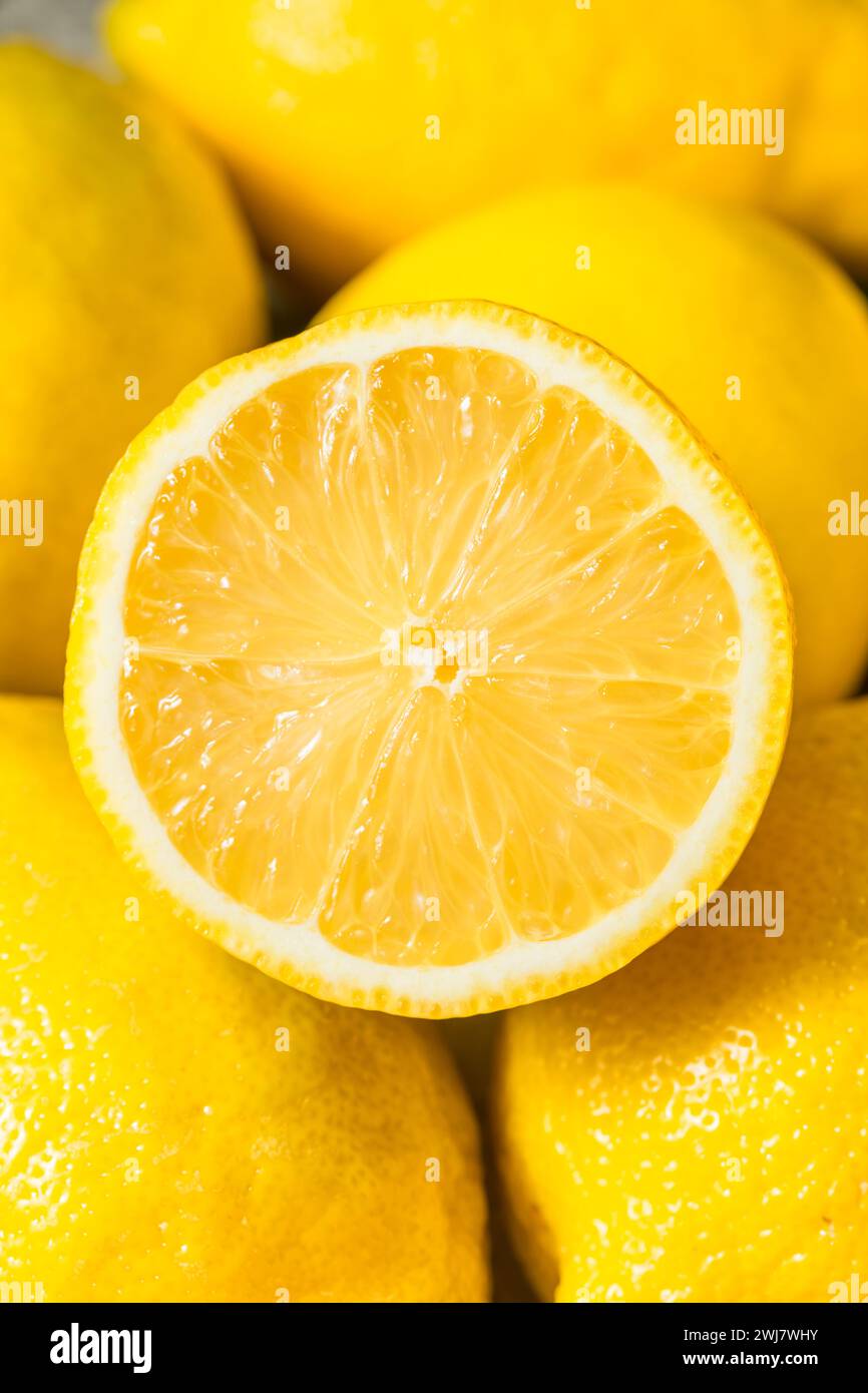 Organic Raw Yellow Seedless Lemons in a Bunch Stock Photo - Alamy