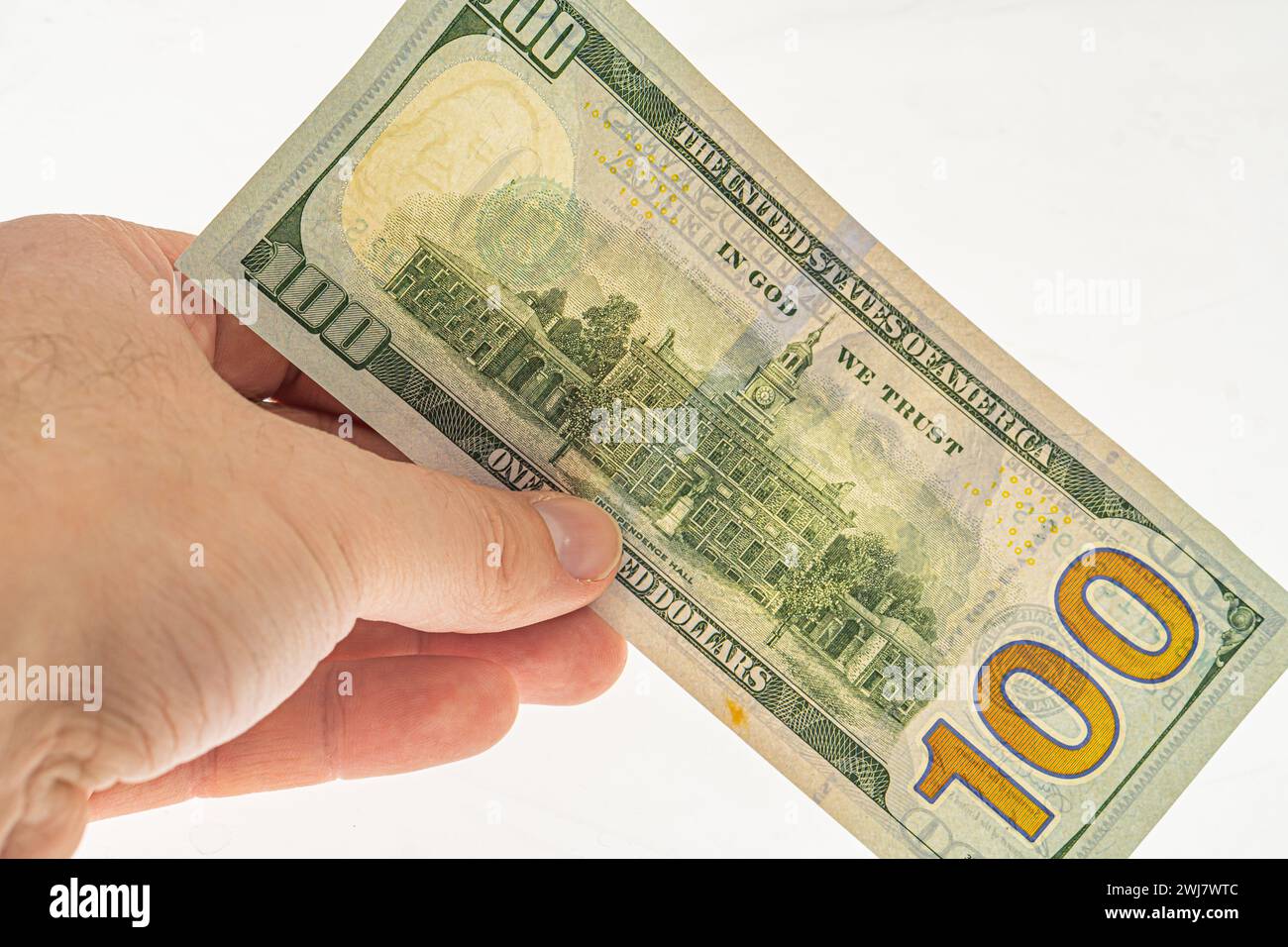 Authentication of banknote 100 dollars for clearance. Watermarks on a ...