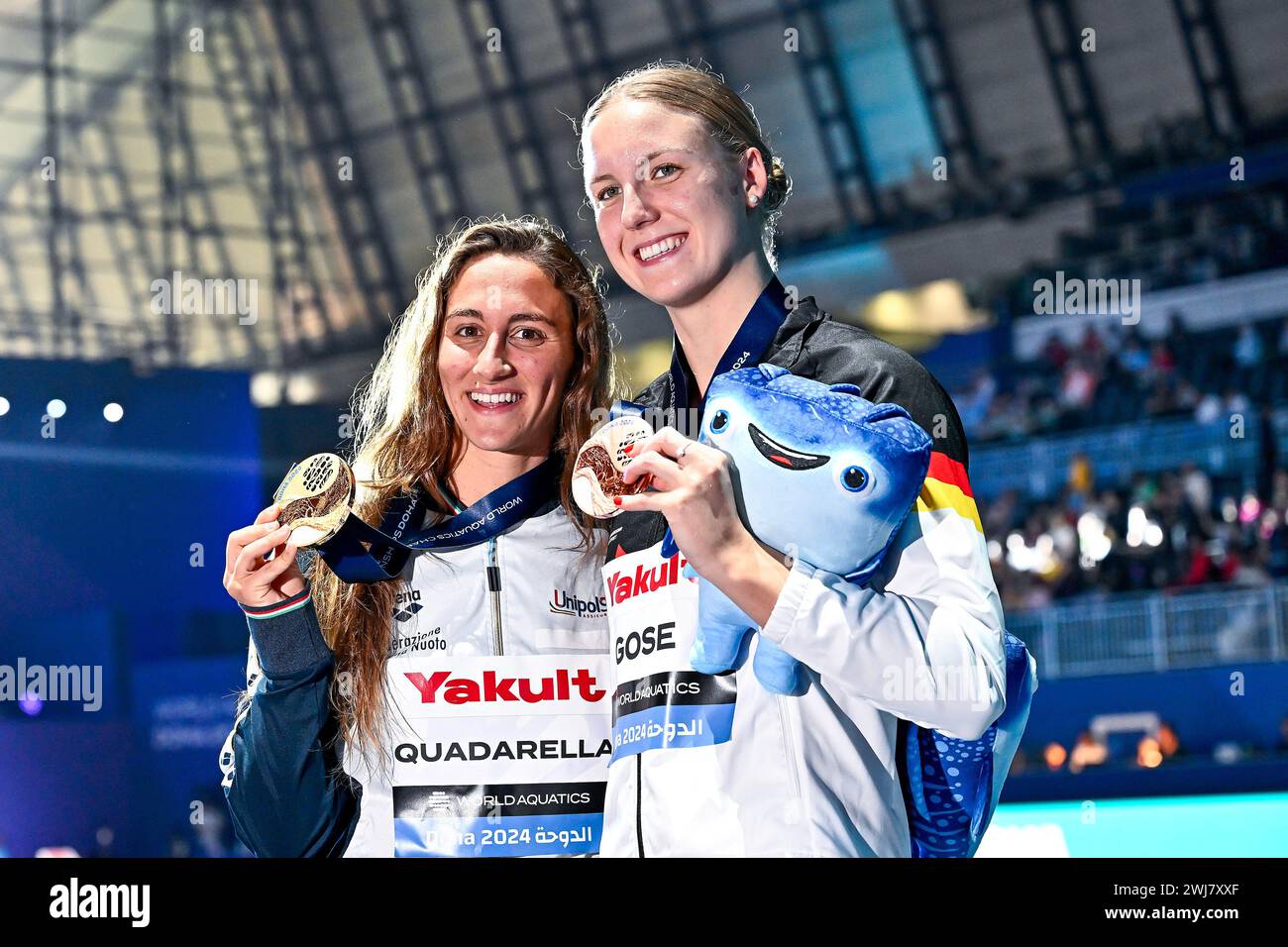 Doha, Qatar. 13th Feb, 2024. Simona Quadarella of Italy and Isabel Gose ...