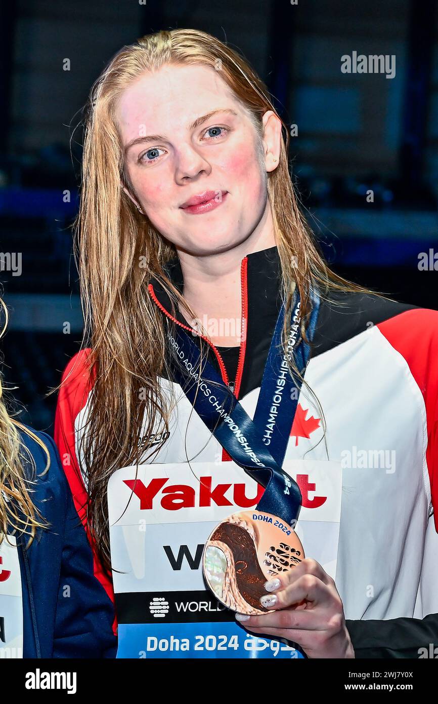 Doha, Qatar. 13th Feb, 2024. Ingrid Wilm of Canada shows the bronze ...