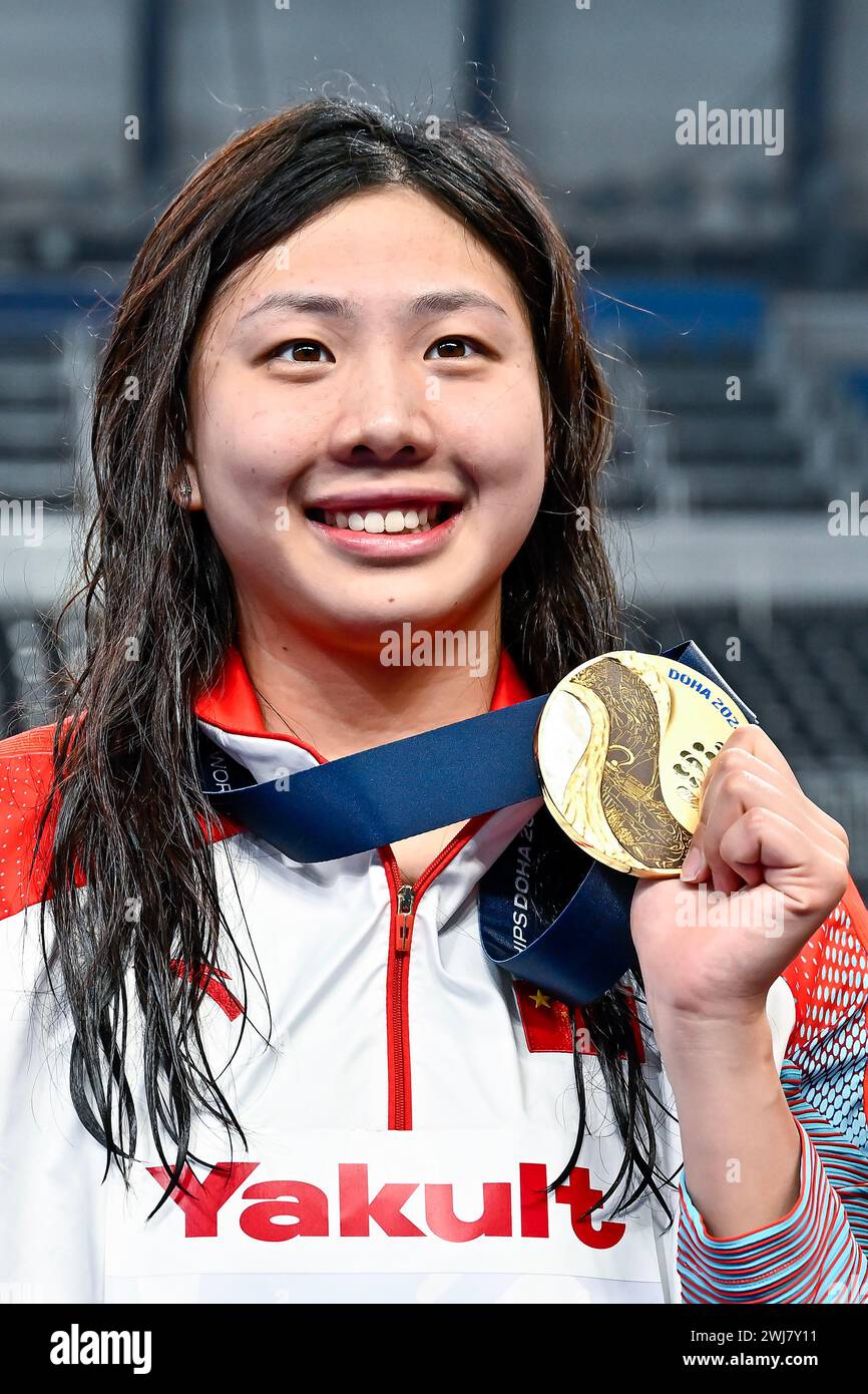 Doha, Qatar. 13th Feb, 2024. Qianting Tang of China shows the gold ...