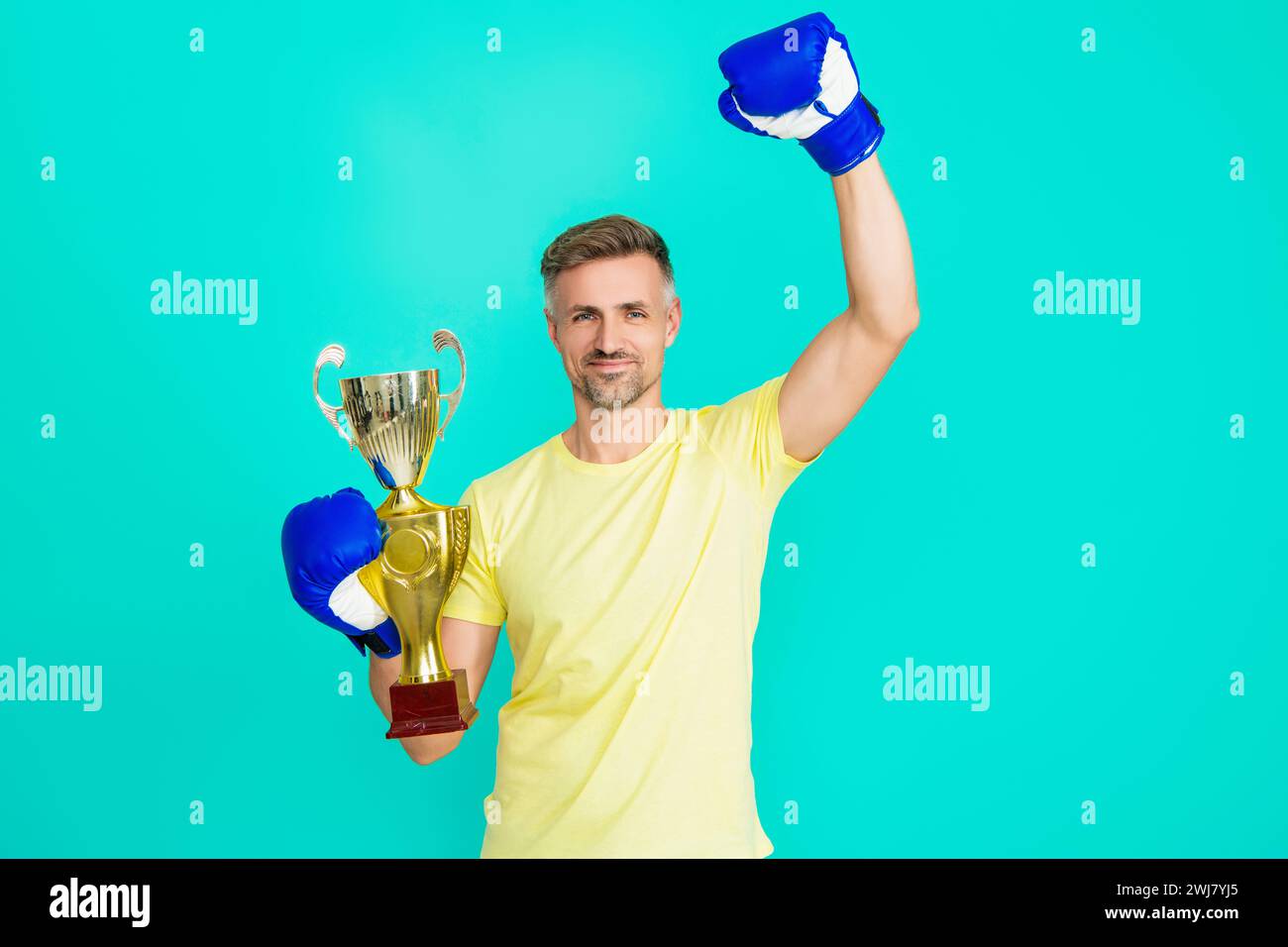 Sportsman winner in boxing sport. Successful sport. Mature boxer ...