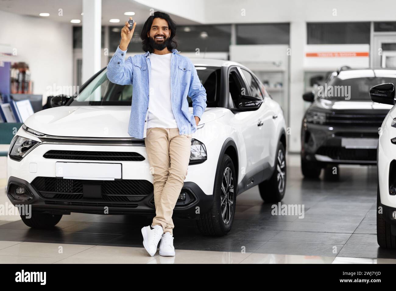 Indian man with car keys hi-res stock photography and images - Alamy