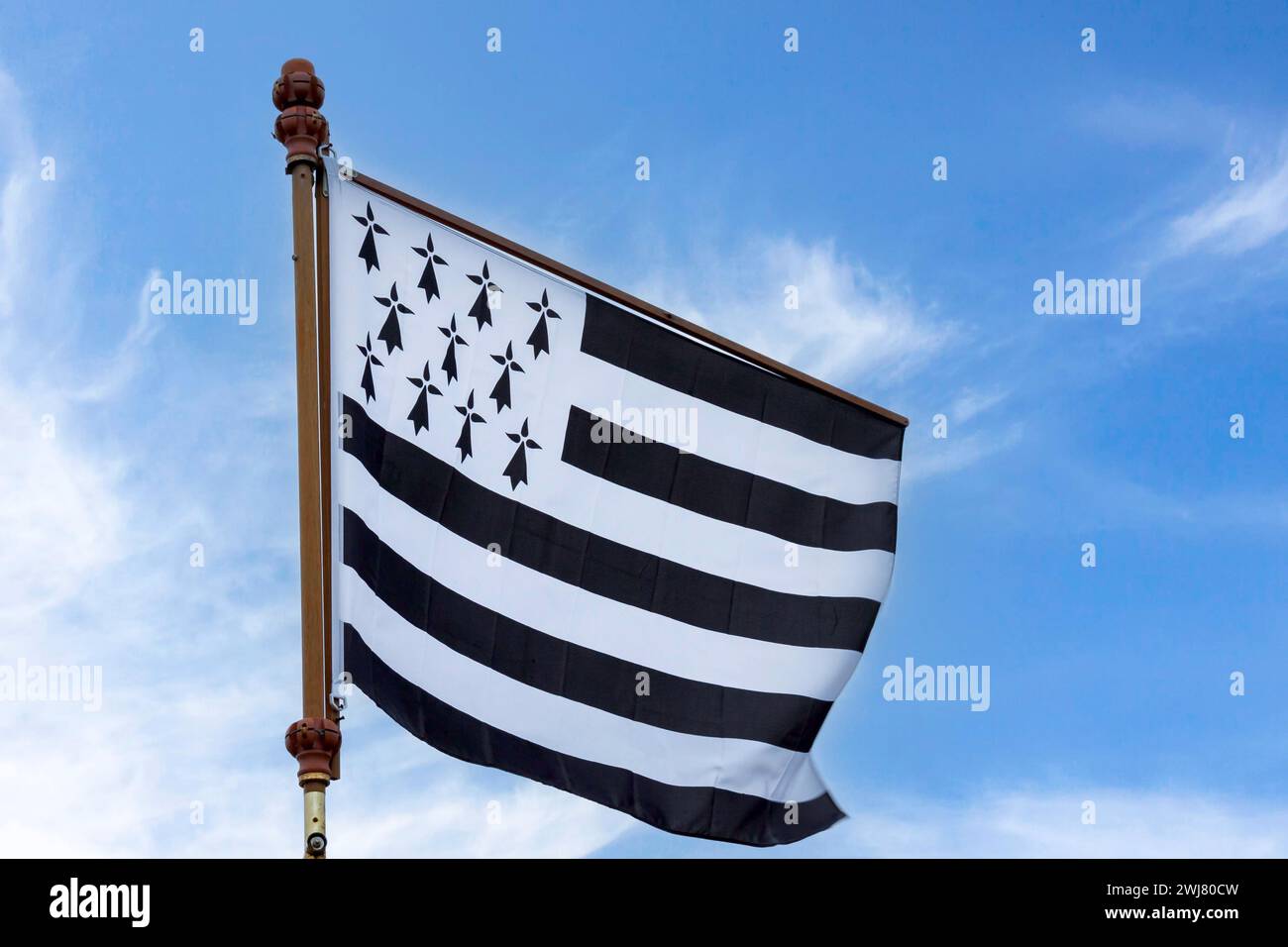 Flag of Brittany, also known as Gwenn ha Du, blowing in the wind ...