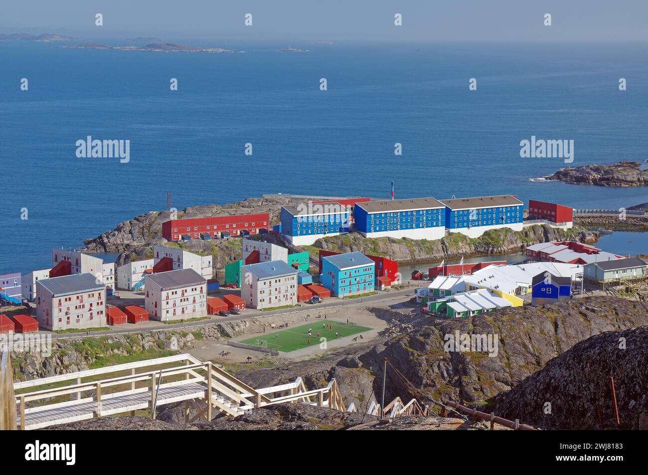 View over parts of the town, wooden stairs and the sea, Maniitsoq ...