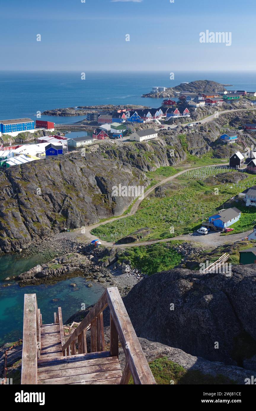 View over houses, barren mountains, stairs, Maniitsoq, Greenland ...