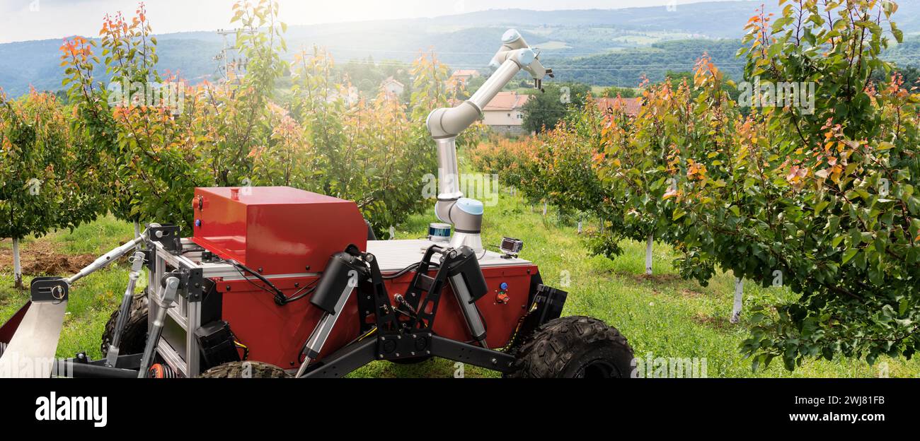 Autonomous agricultural robot with robotic arm. Smart farm concept ...