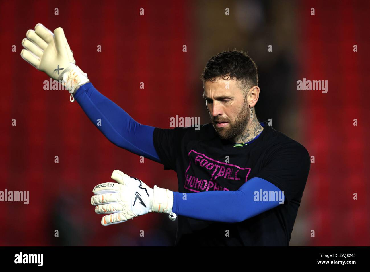 Derby County goalkeeper Scott Loach wearing a 'Football v Homophobia ...