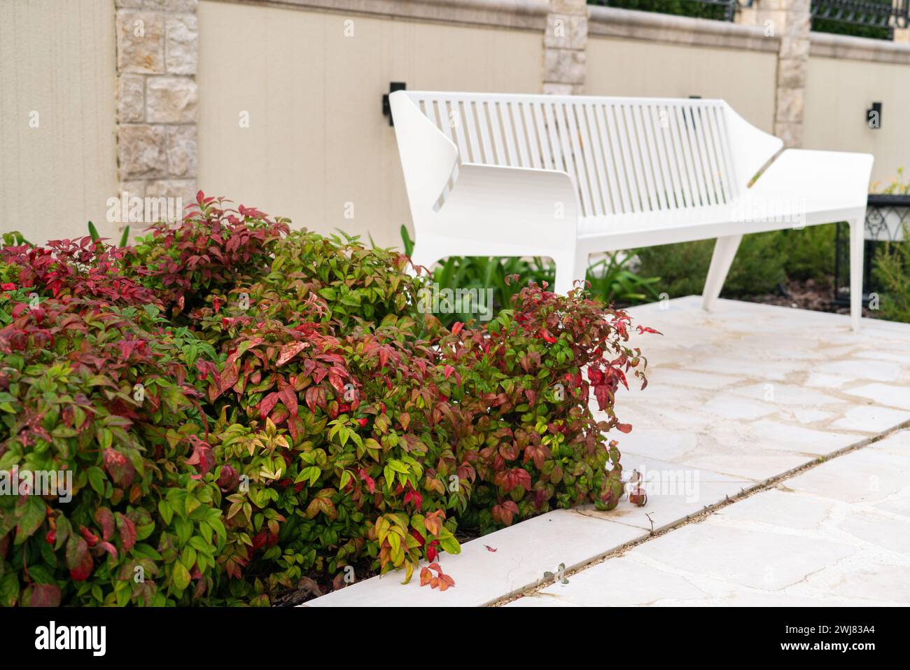 White bench in a summer resort Stock Photo - Alamy