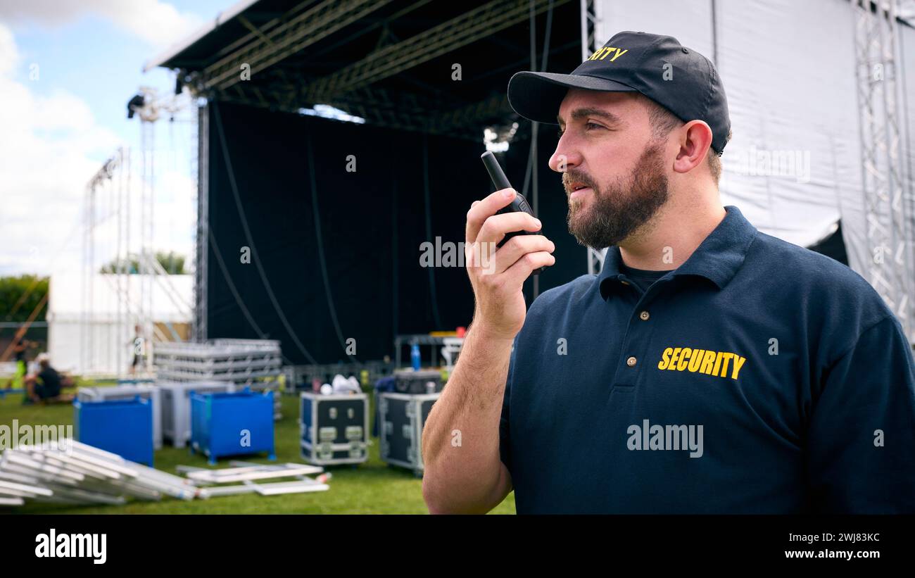 Security Team At Outdoor Stage For Music Festival Or Concert Talking ...