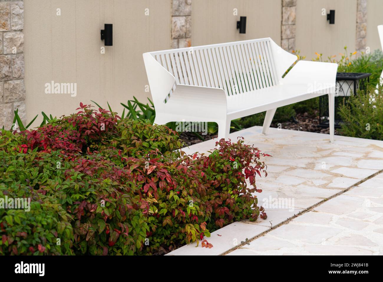 White bench in a summer resort Stock Photo - Alamy
