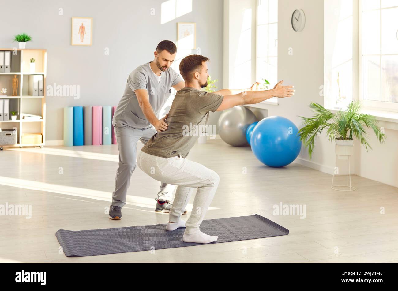 Male patient doing exercise hi-res stock photography and images - Alamy