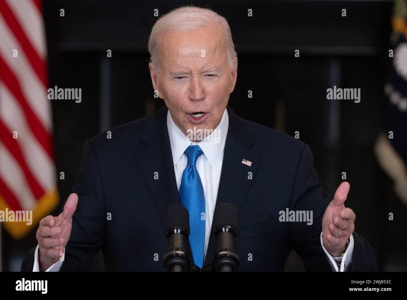US President Joe Biden delivers remarks in the State Dining Room of the ...