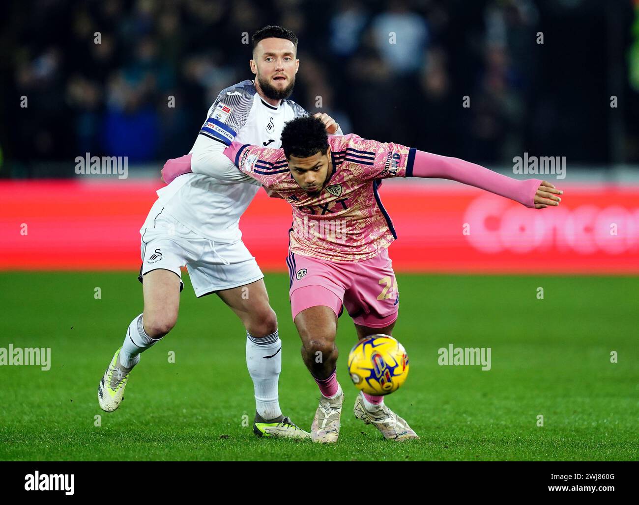 Leeds United's Georginio Rutter and Swansea City's Matt Grimes (left ...