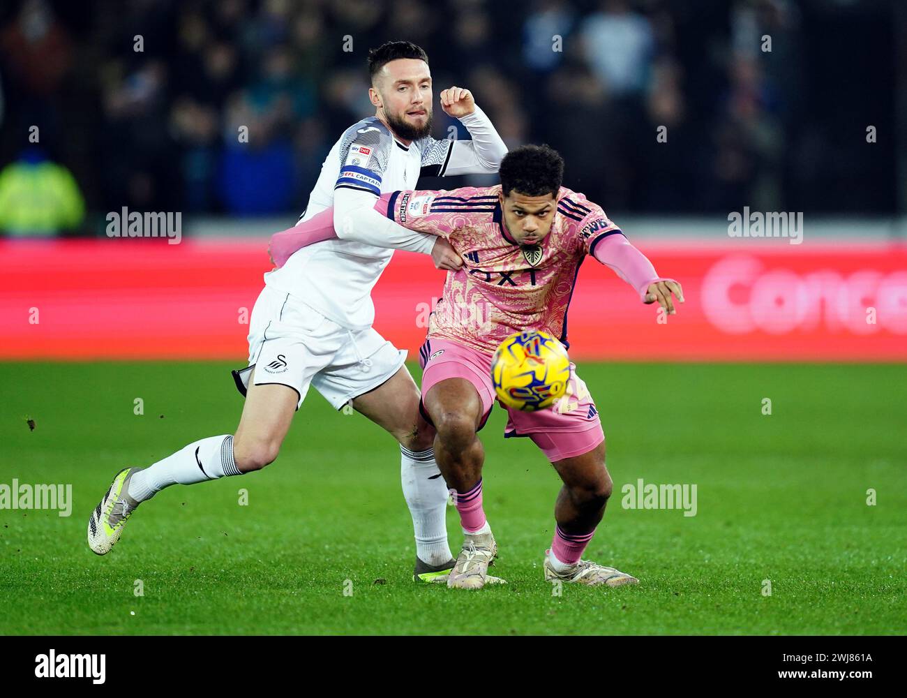 Leeds United's Georginio Rutter and Swansea City's Matt Grimes (left ...
