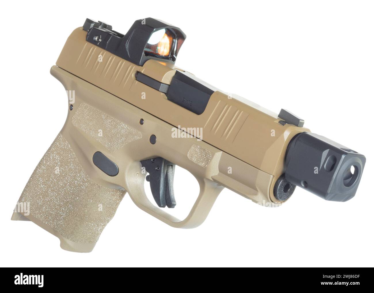 Concealed carry 9 mm automatic pistol with a muzzle brake mounted on ...