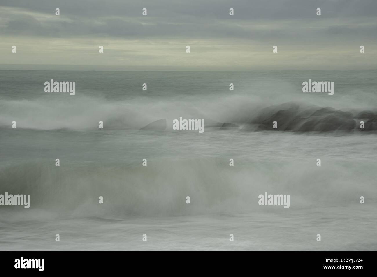 Slow shutter and intentional camera movement photo of breaking waves ...