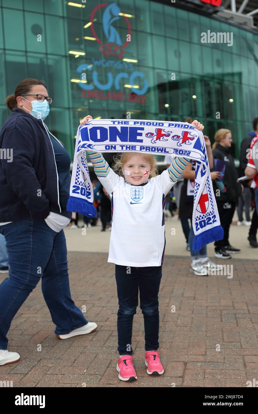 Little girl England Lionesses fan with England shirt and scarf England ...