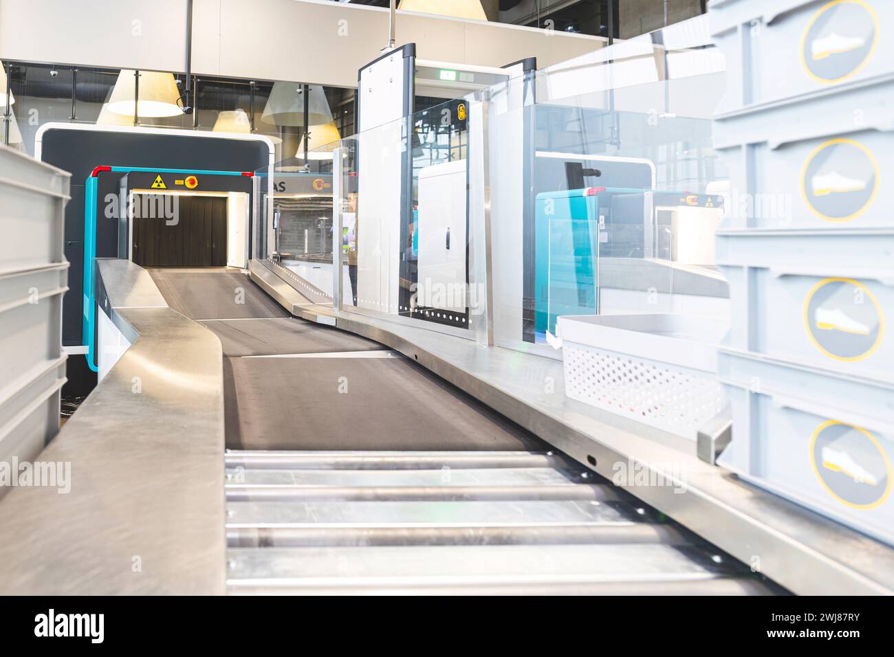 Security baggage scanners and gates with metal detectors at airport ...