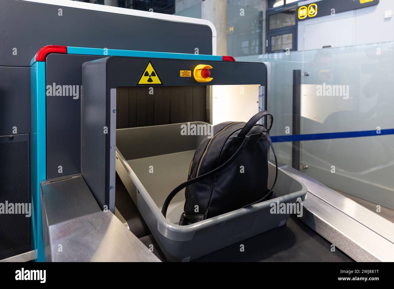 Close-up of scanning travel baggage with x-ray scanner at airport security checkpoint Stock ...