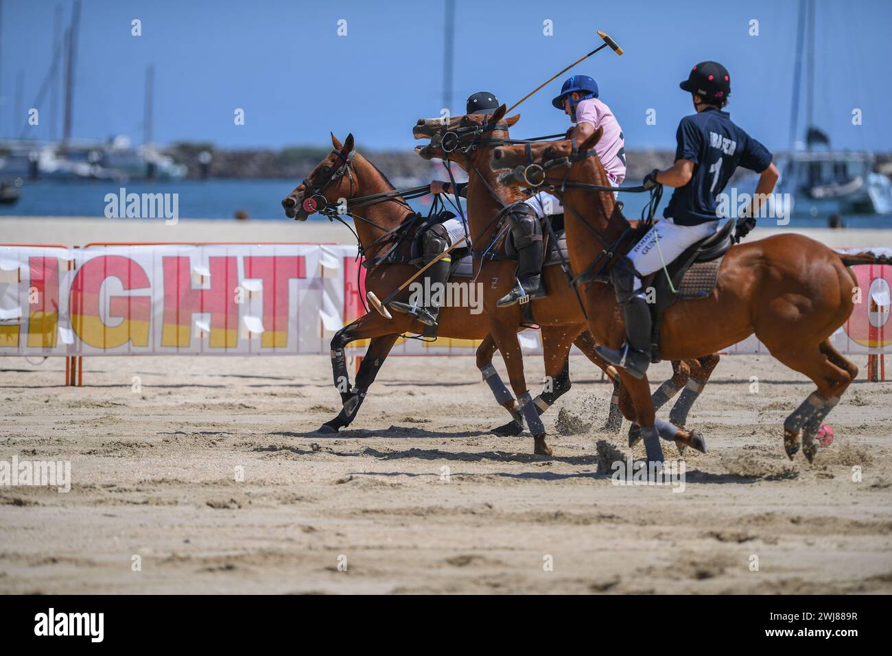 Polo players from Captain Baxter and Whispering Angel team are seen in ...