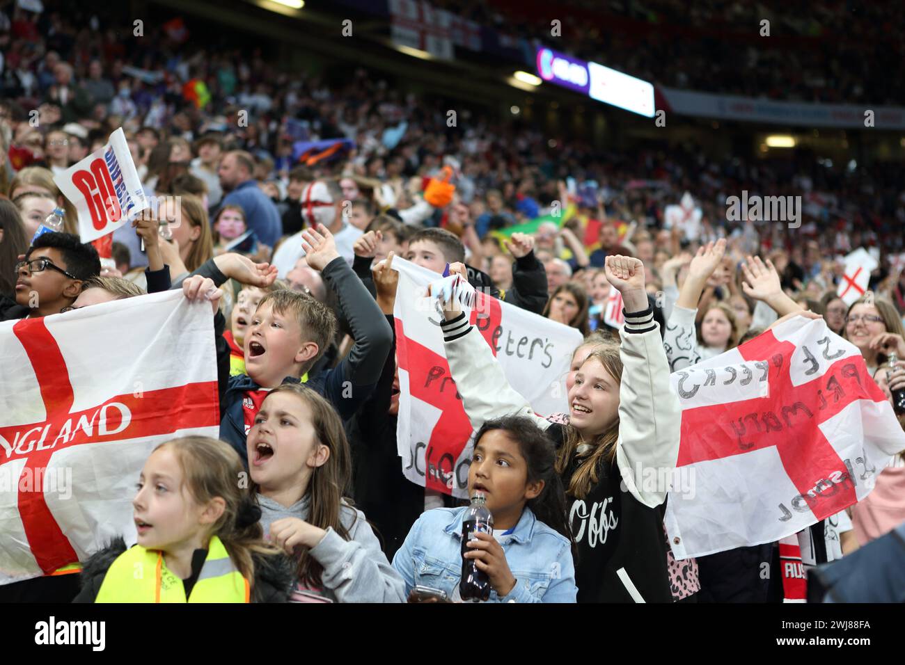 Girls and boys cheer with flags England v Austria UEFA Womens Euro 6 ...