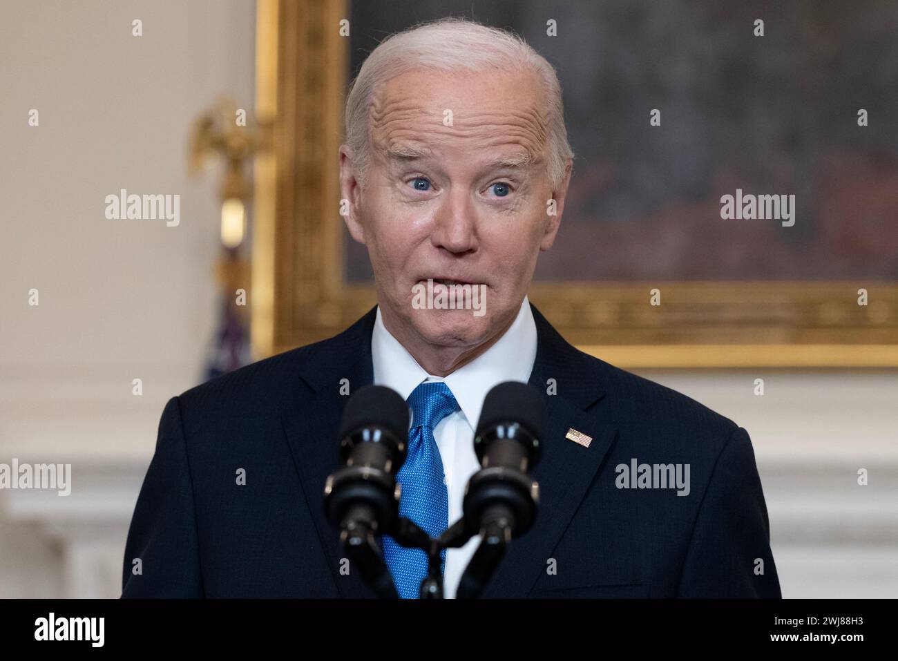 US President Joe Biden delivers remarks in the State Dining Room of the ...